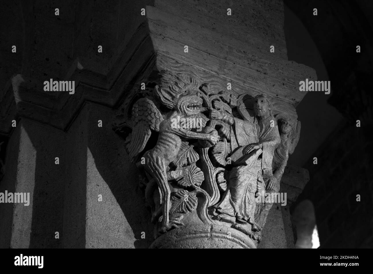 Temptation of Christ. Romanesque pillar capital. Architetural detail of ...