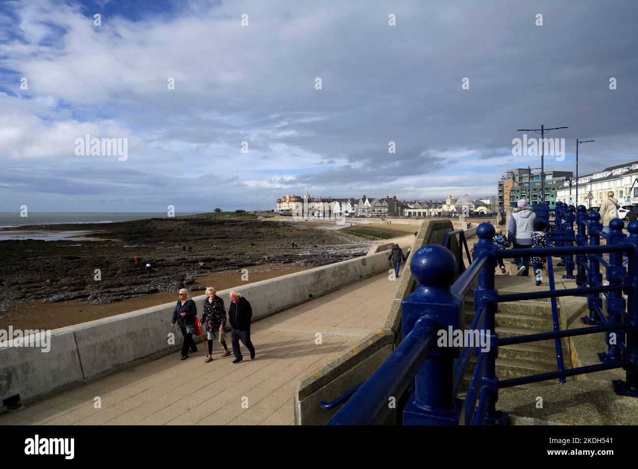 People enjoying the seaside. Promenade / Esplanade and view of ...