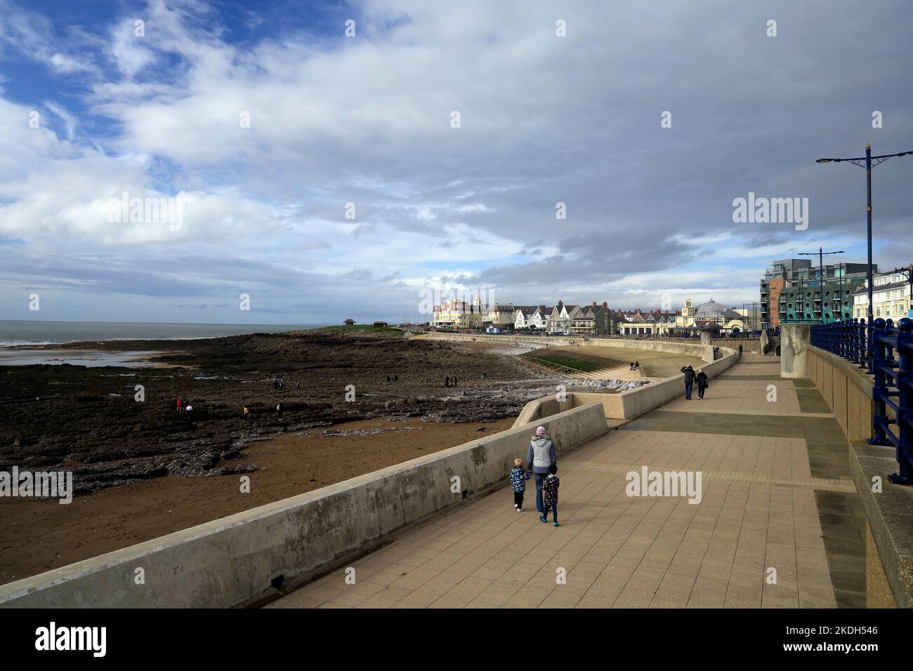 People enjoying the seaside. Promenade / Esplanade and view of ...