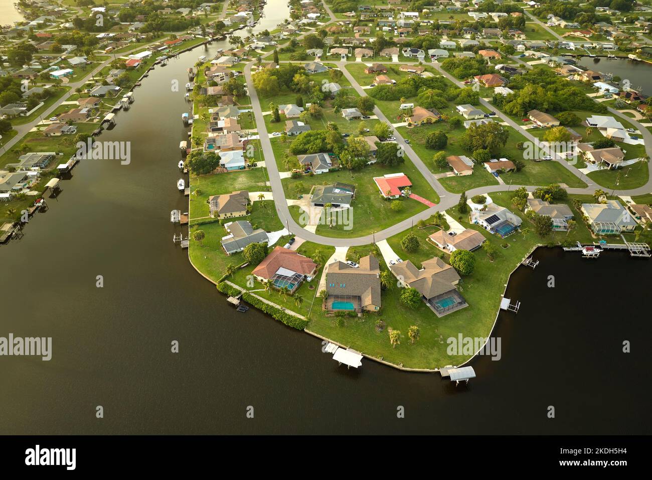 Aerial view of rural private houses in remote suburbs located on sea ...
