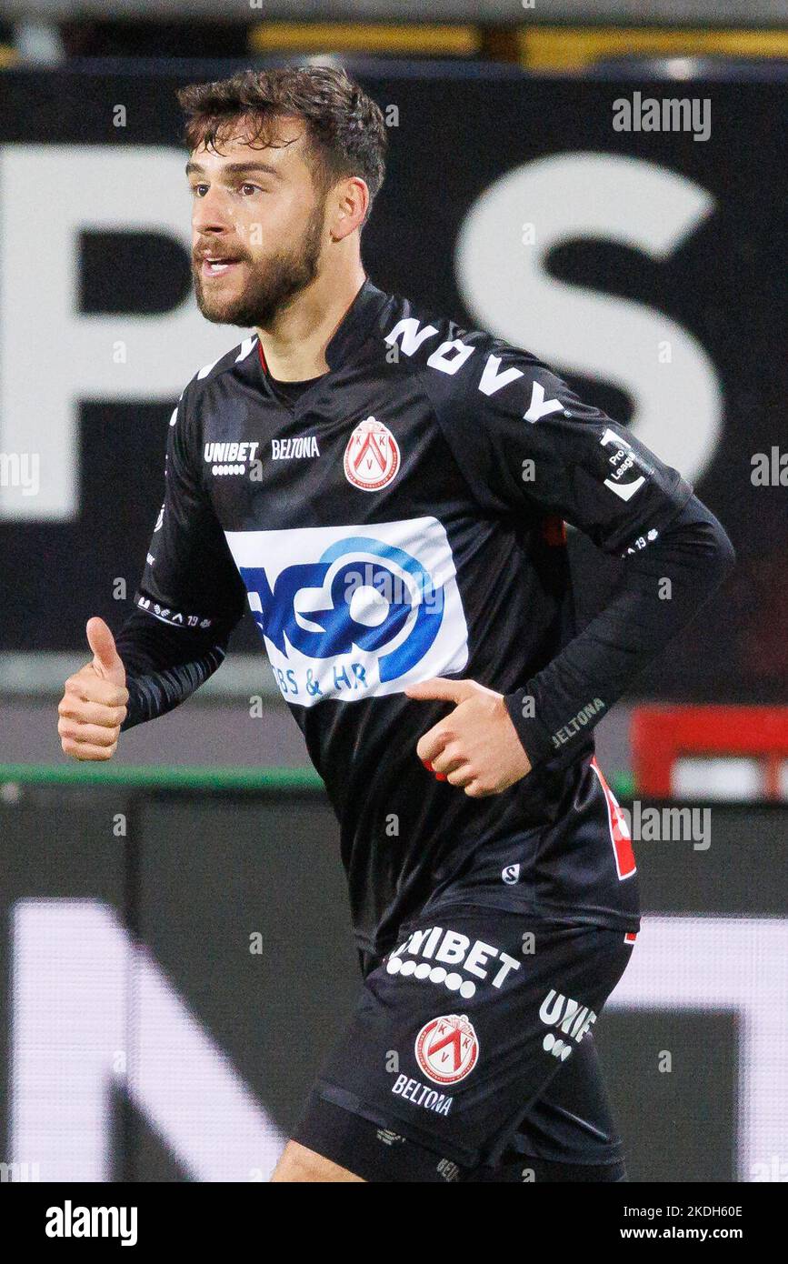 Kortrijk's Massimo Bruno celebrates after scoring during a soccer match ...