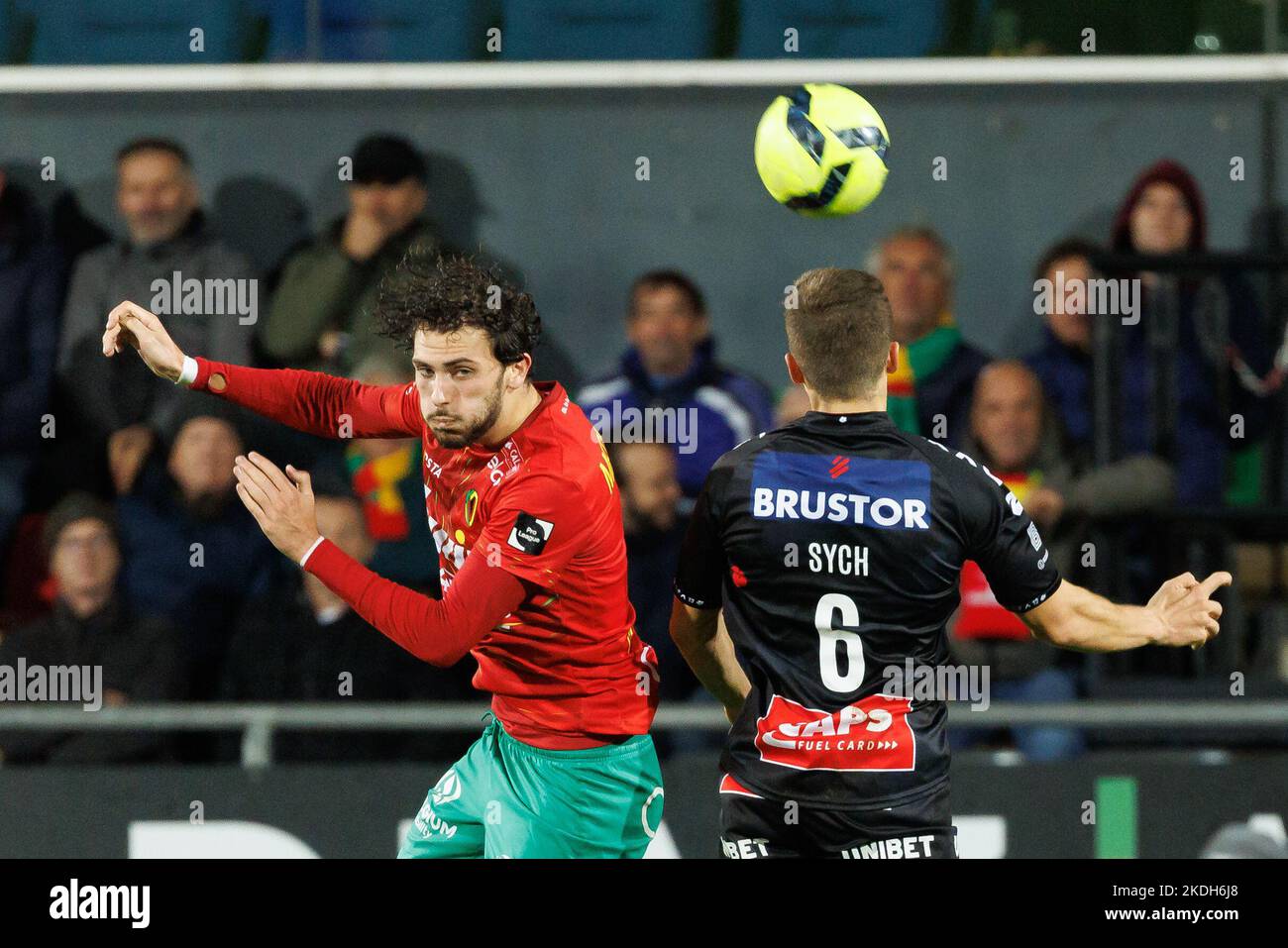 Oostende's Fraser Hornby and Kortrijk's Oleksii Sych fight for the ball during a soccer match ...