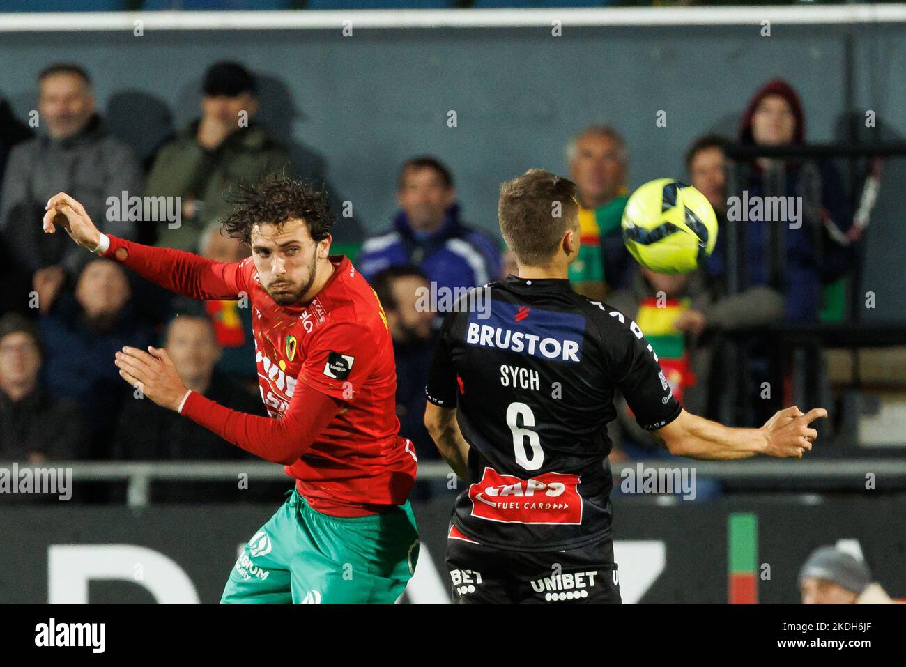 Oostende's Fraser Hornby and Kortrijk's Oleksii Sych fight for the ball during a soccer match ...