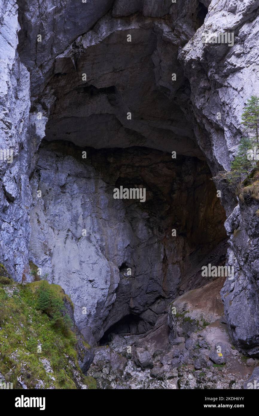 Huge cavern landscape of a natural cave in the limestone mountains ...