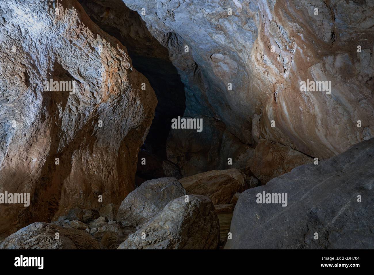 Huge cavern landscape of a natural cave in the limestone mountains ...