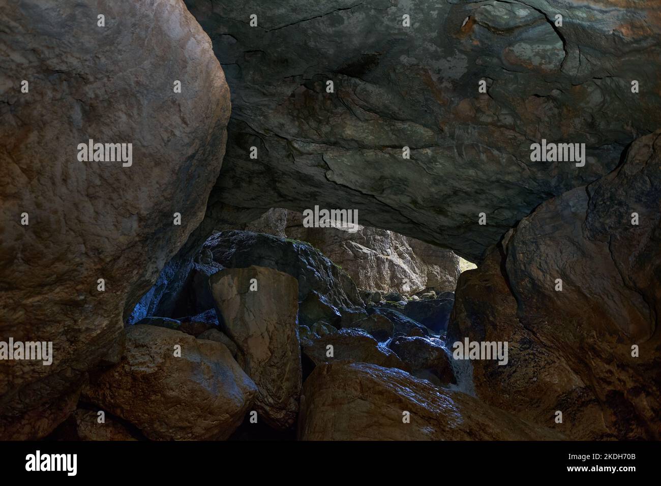 Huge cavern landscape of a natural cave in the limestone mountains ...