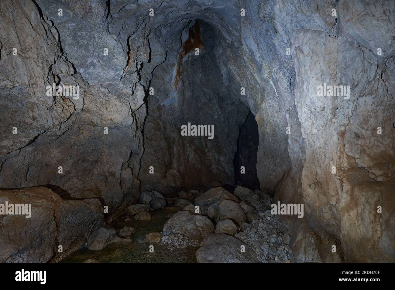 Huge cavern landscape of a natural cave in the limestone mountains ...