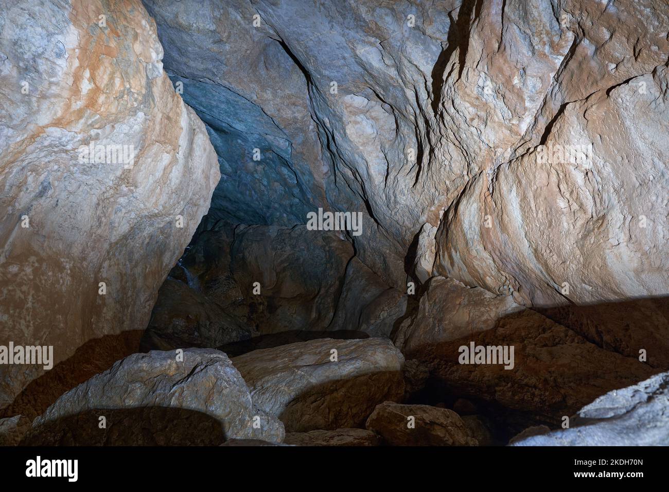 Huge cavern landscape of a natural cave in the limestone mountains ...