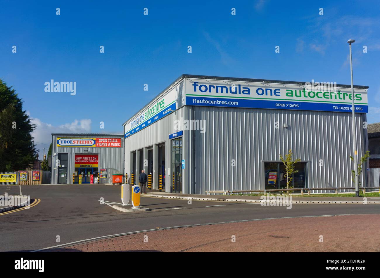 Formula one autocentres garage with a blue sky background on Lister Way ...