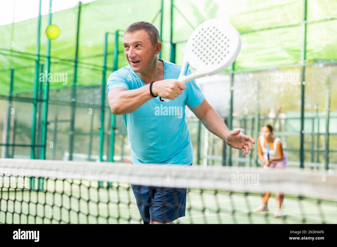 European man padel tennis player trains on the court Stock Photo - Alamy