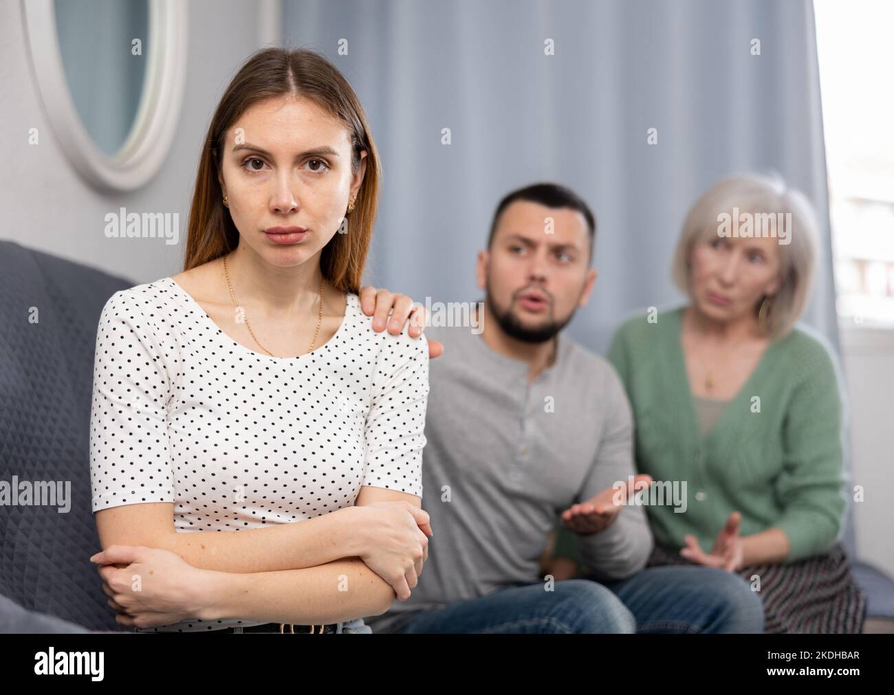 Family quarrel - wife cries after husband and elderly mother screams ...