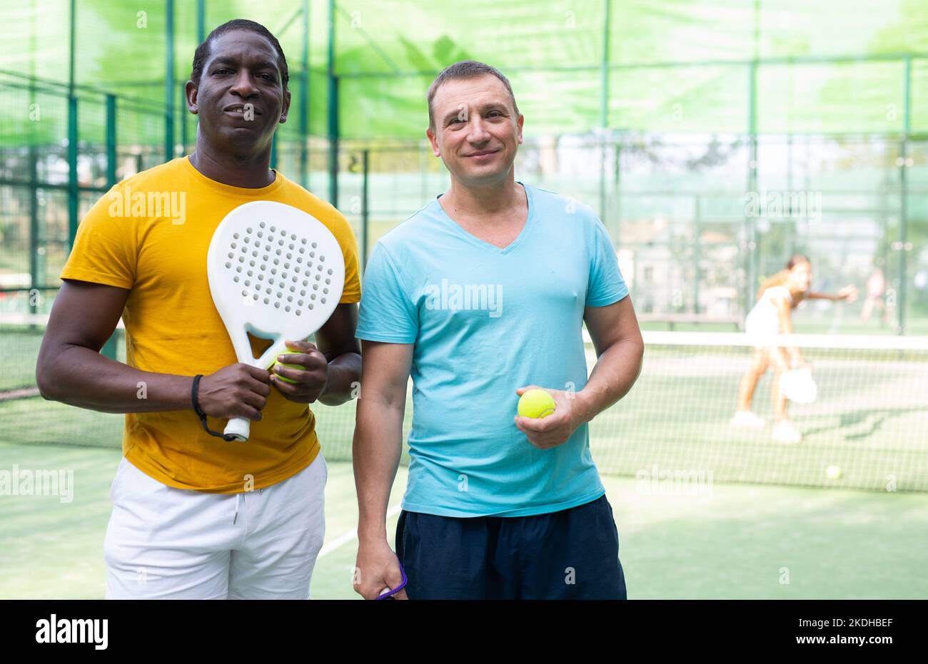 Portrait of two men padel tennis players Stock Photo - Alamy