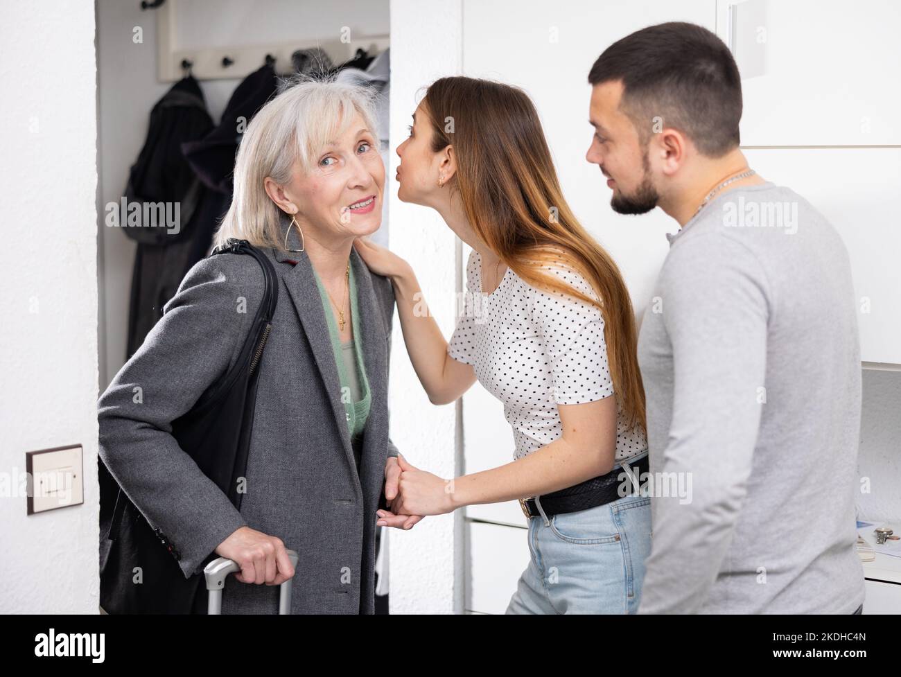 Mother visits her adult children at their home Stock Photo - Alamy