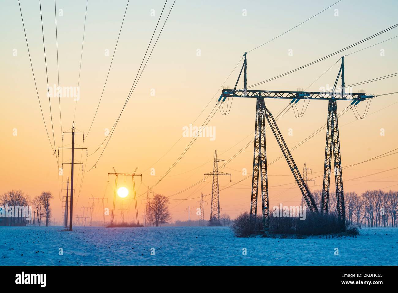 Ukraine electricity grid in winter time. Power line pylons in cold ...