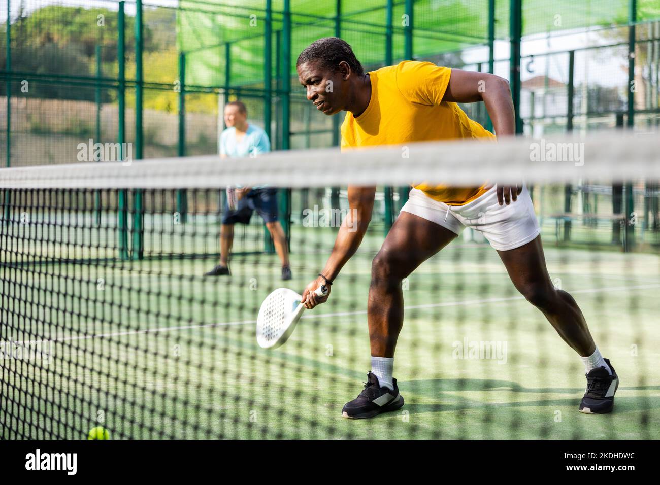 Tennis player hitting ball african hi-res stock photography and images ...