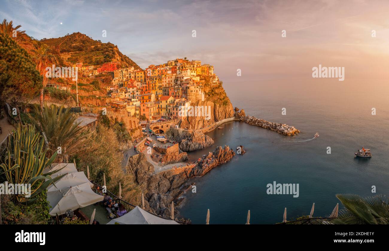 Manarola town at sunset in panoramic view Stock Photo - Alamy