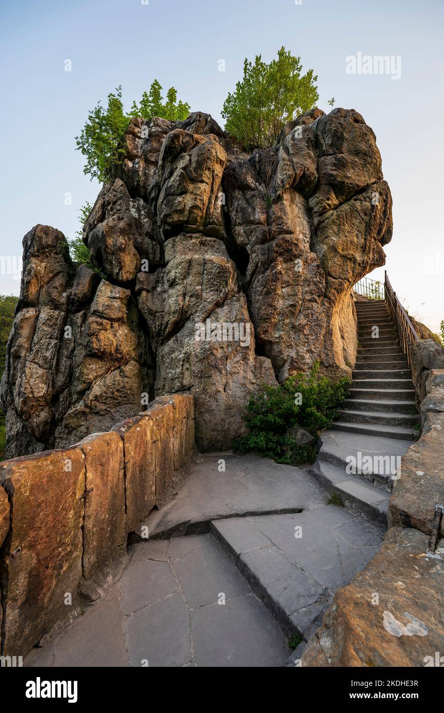 Rock stairway at the Externsteine in warm morning light, Teutoburg ...