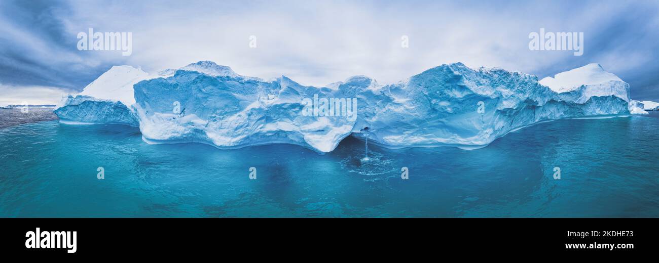 extreme iceberg in panoramic view Stock Photo - Alamy