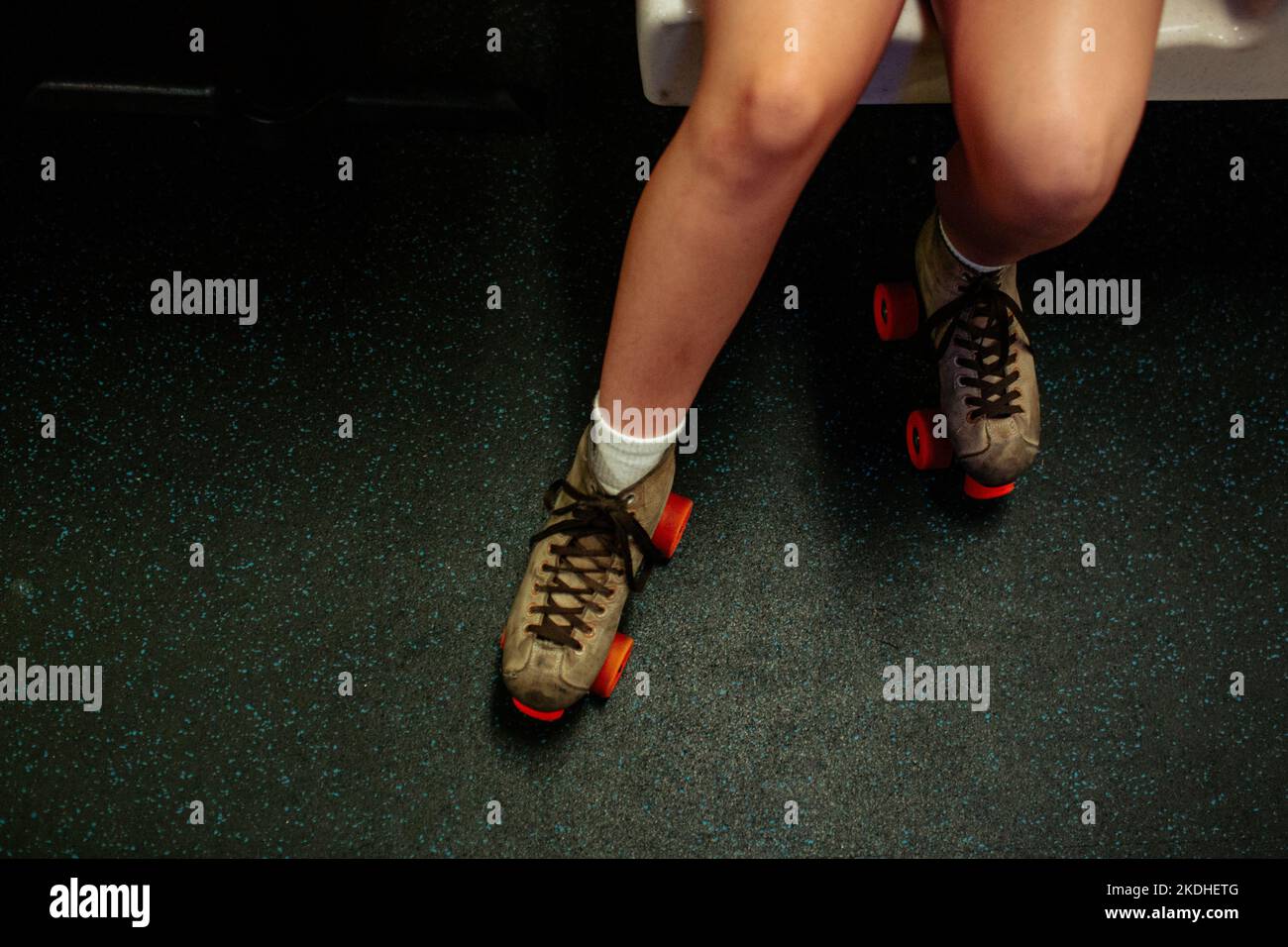 Teen girl wearing roller skates Stock Photo - Alamy