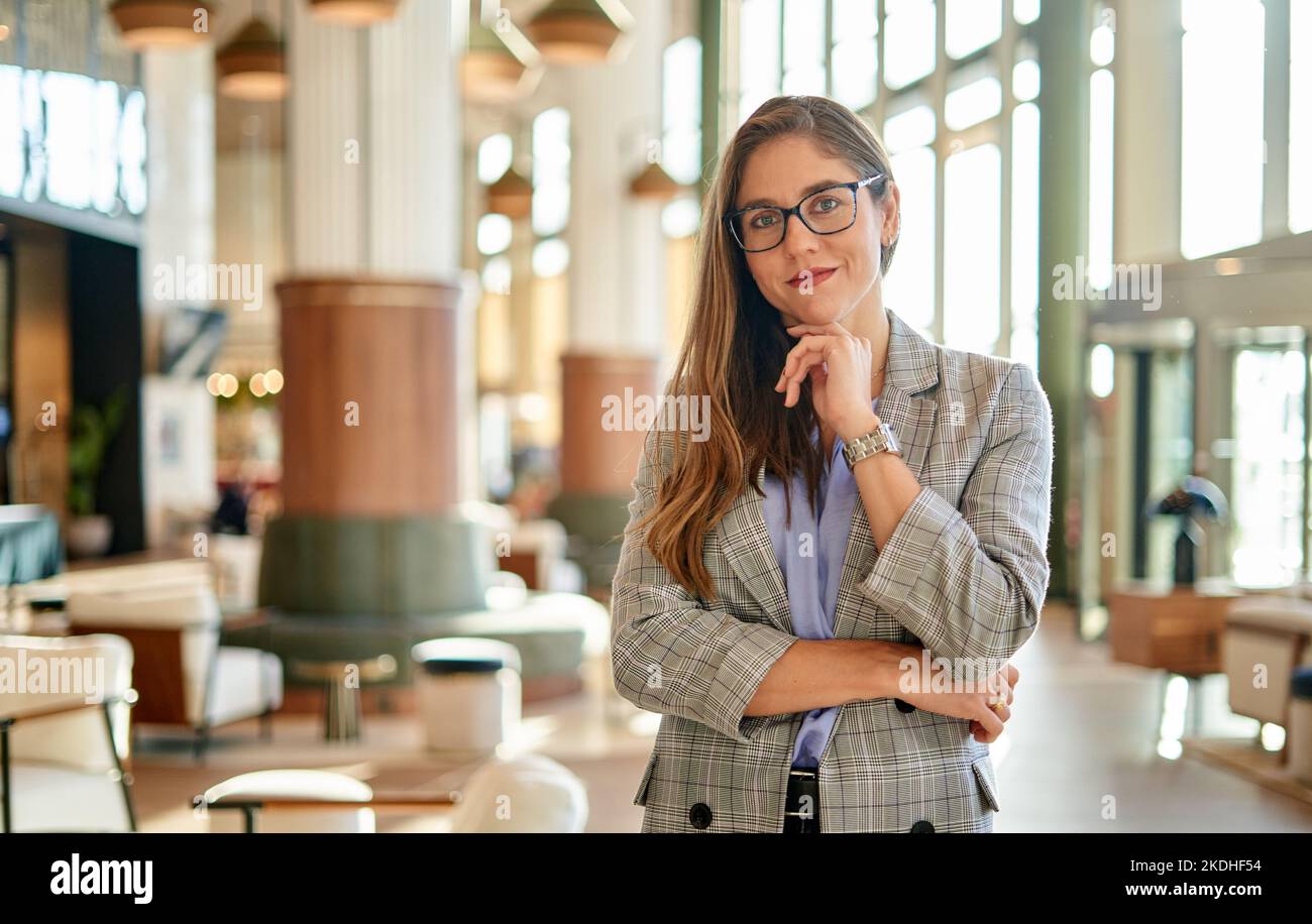 The smiling bank manager with a big smile in a big building Stock Photo ...