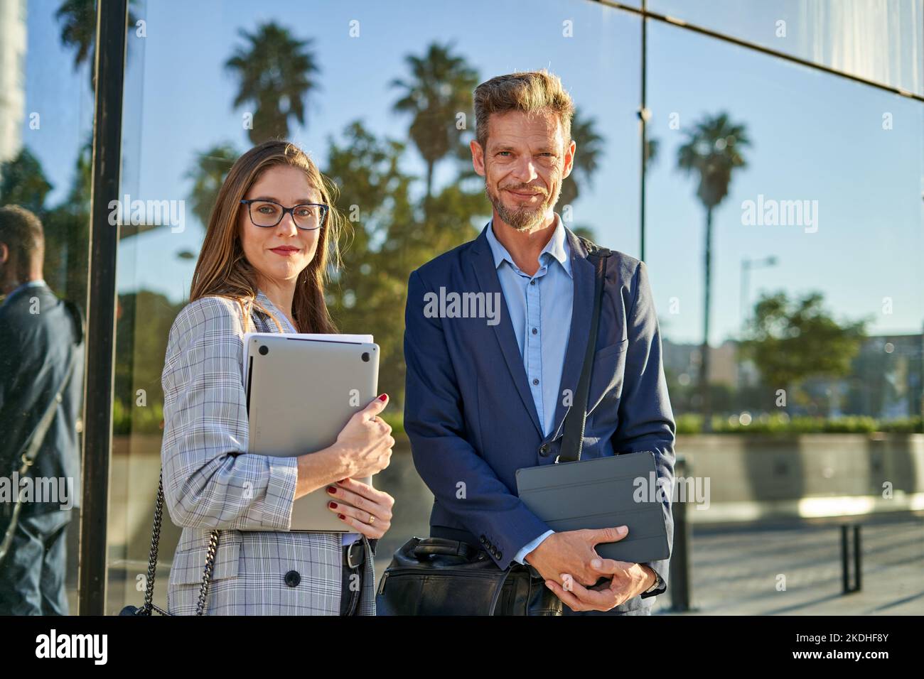 Business people dressed in formal wear looking at camera Stock Photo ...