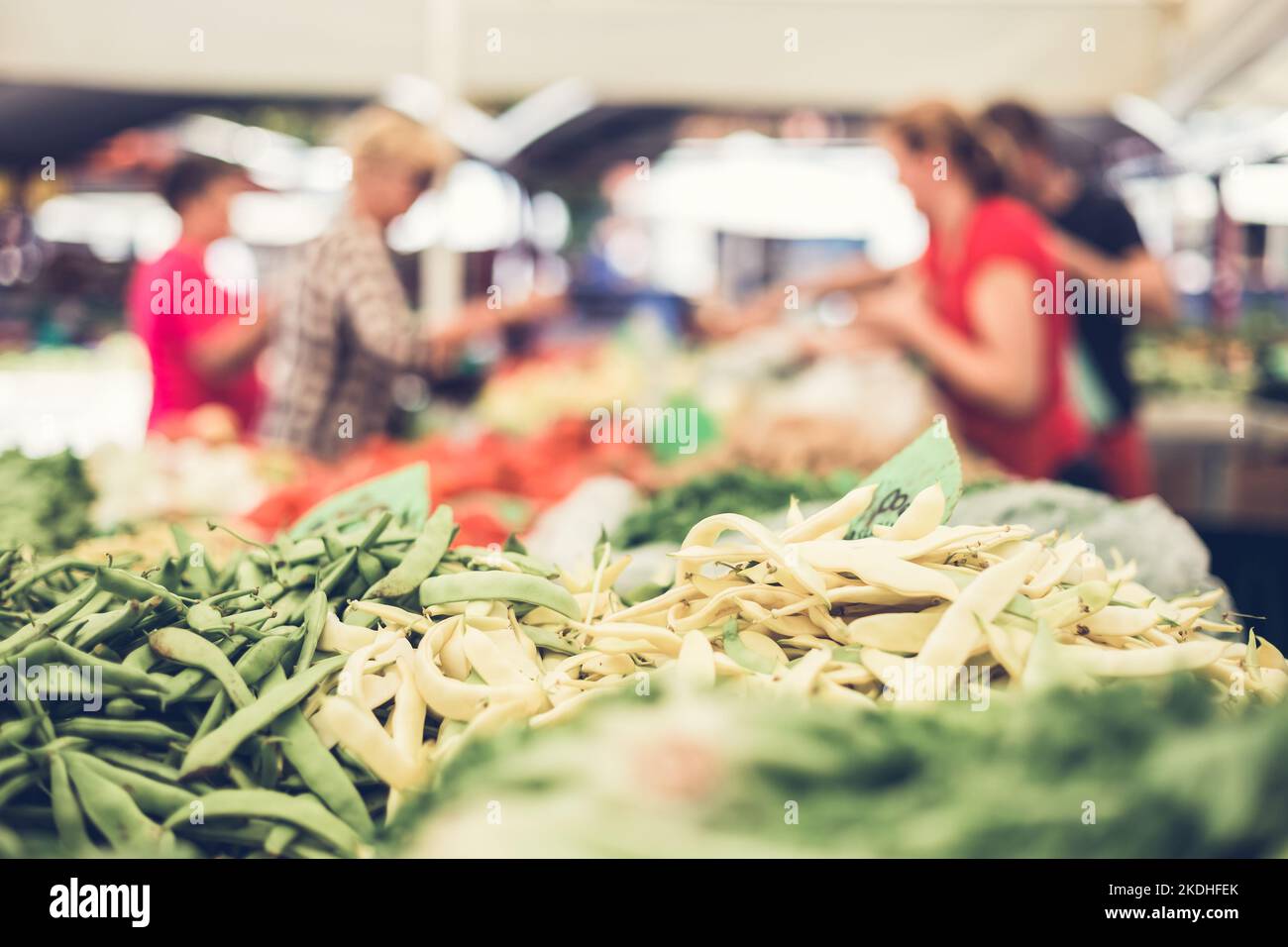 Farmers' food market stall with variety of organic vegetable. Vendor ...