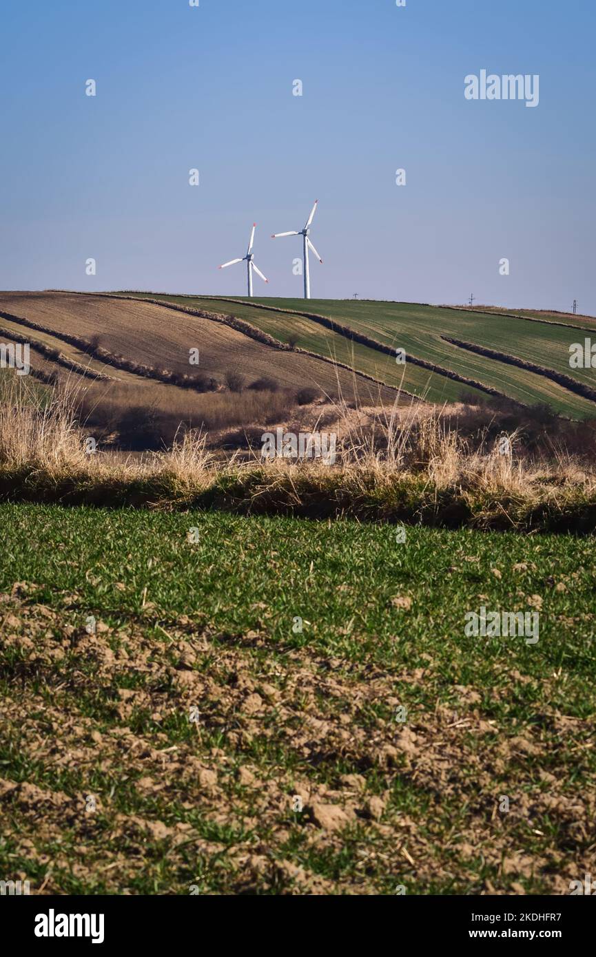Renewable energy sources. Ecological windmills in the countryside in ...