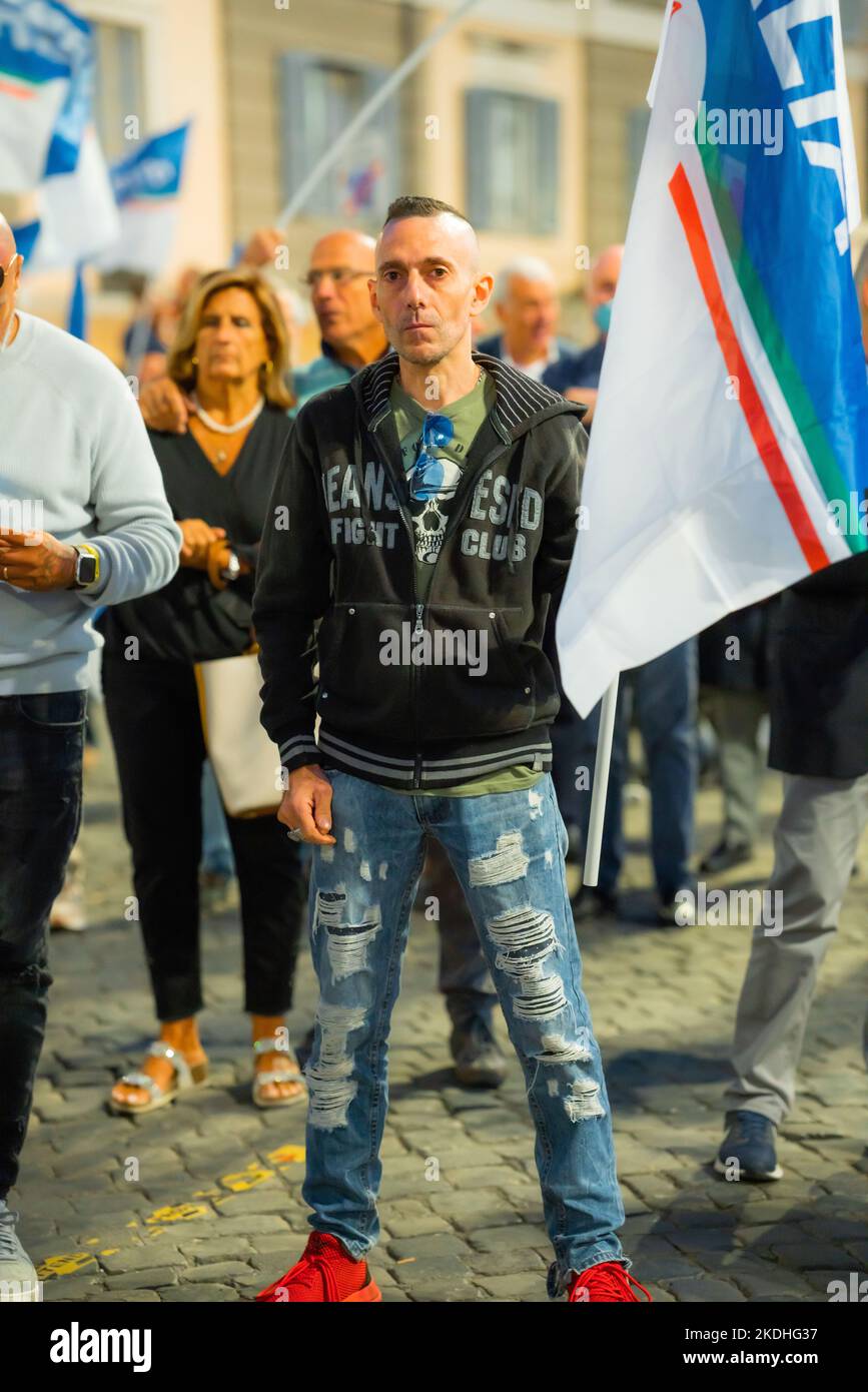 Italian right-wing alliance supporters participate in a closing rally ...