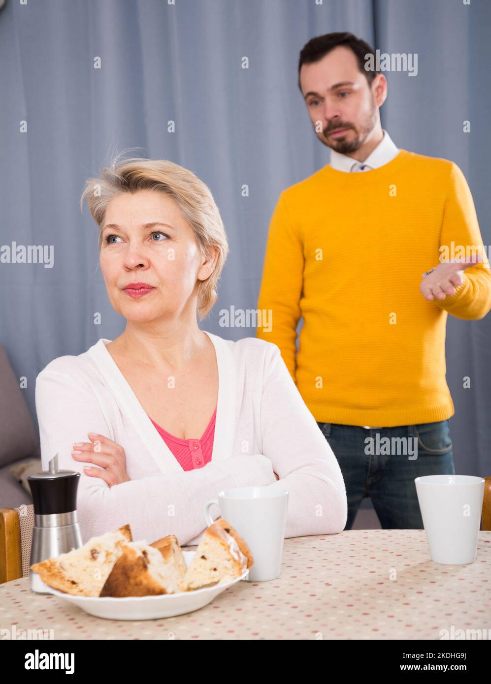 Son proves to mother his position Stock Photo - Alamy