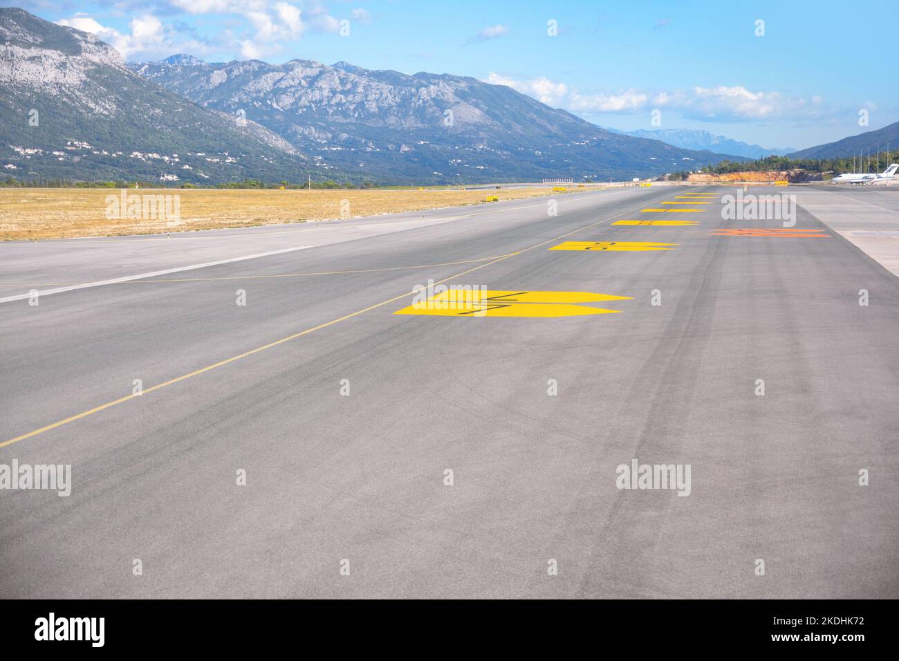 Standard runway marks . Airport runway with marks Stock Photo - Alamy