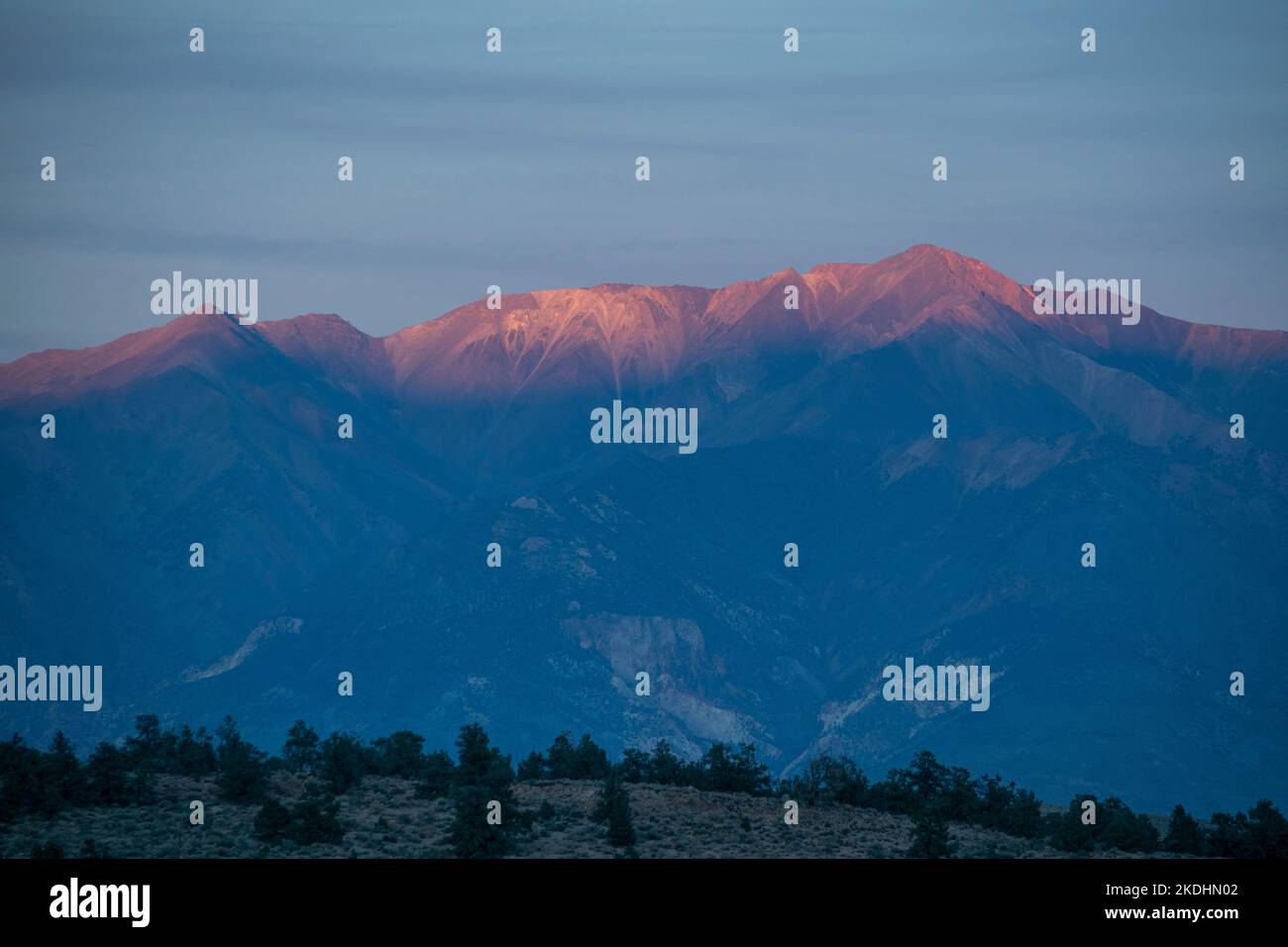 White Mountain Peak glows purple during sunset in Mono and Inyo ...