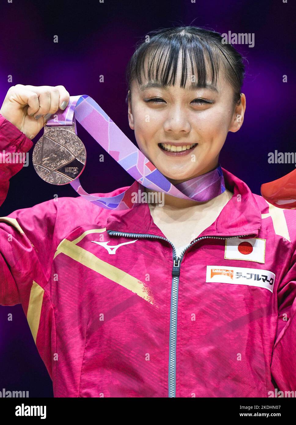 Shoko Miyata of Japan poses with her bronze medal won in the women's balance beam event at the ...