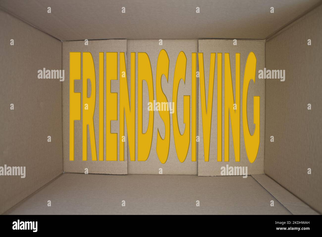 Friendsgiving word with cardboard box. Brown folded card box Stock ...