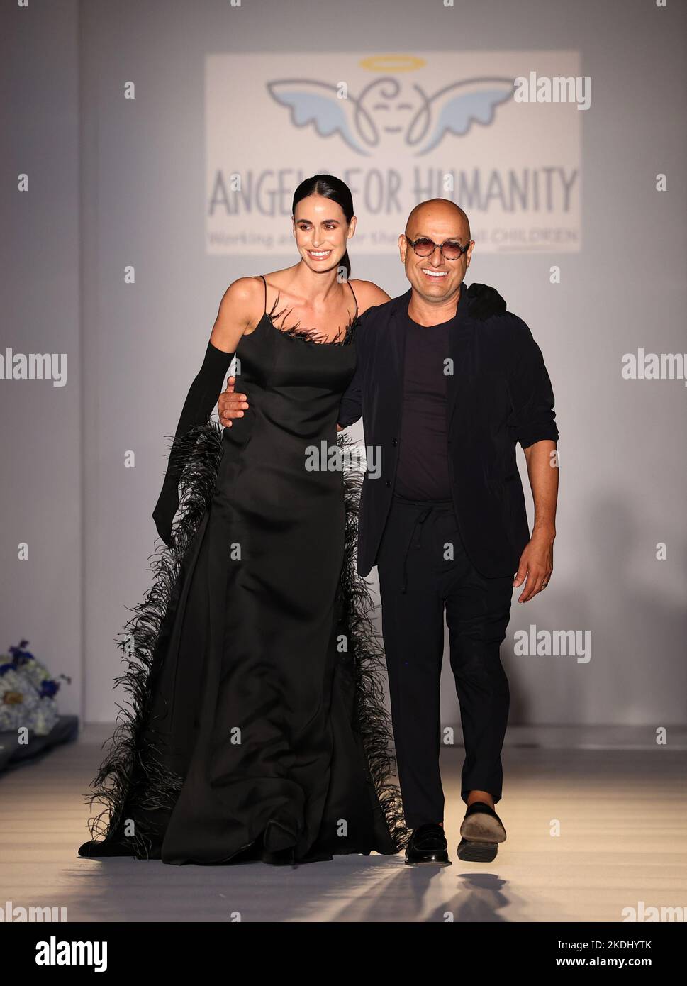 MIAMI, FLORIDA - NOVEMBER 06: Designer Angel Sanchez (R) walks the ...