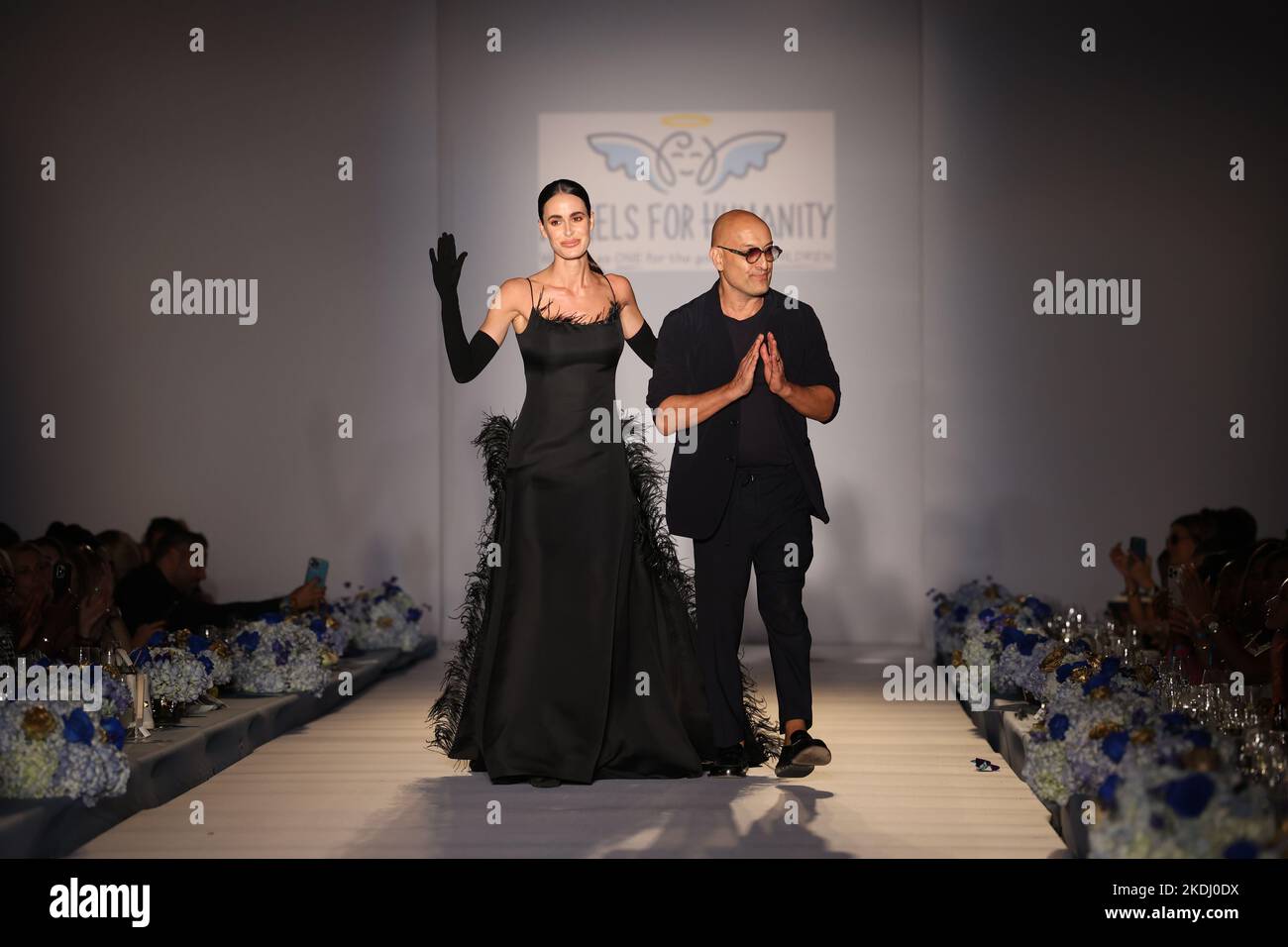 MIAMI, FLORIDA - NOVEMBER 06: Designer Angel Sanchez (R) walks the ...