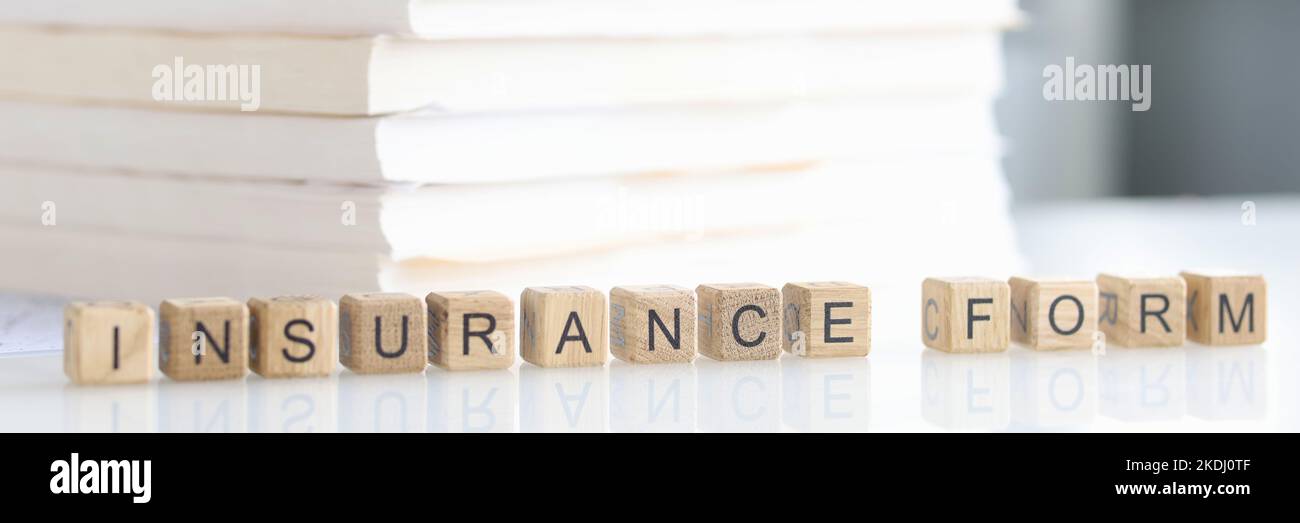 Documents insurance form. Examining information in folder with ...