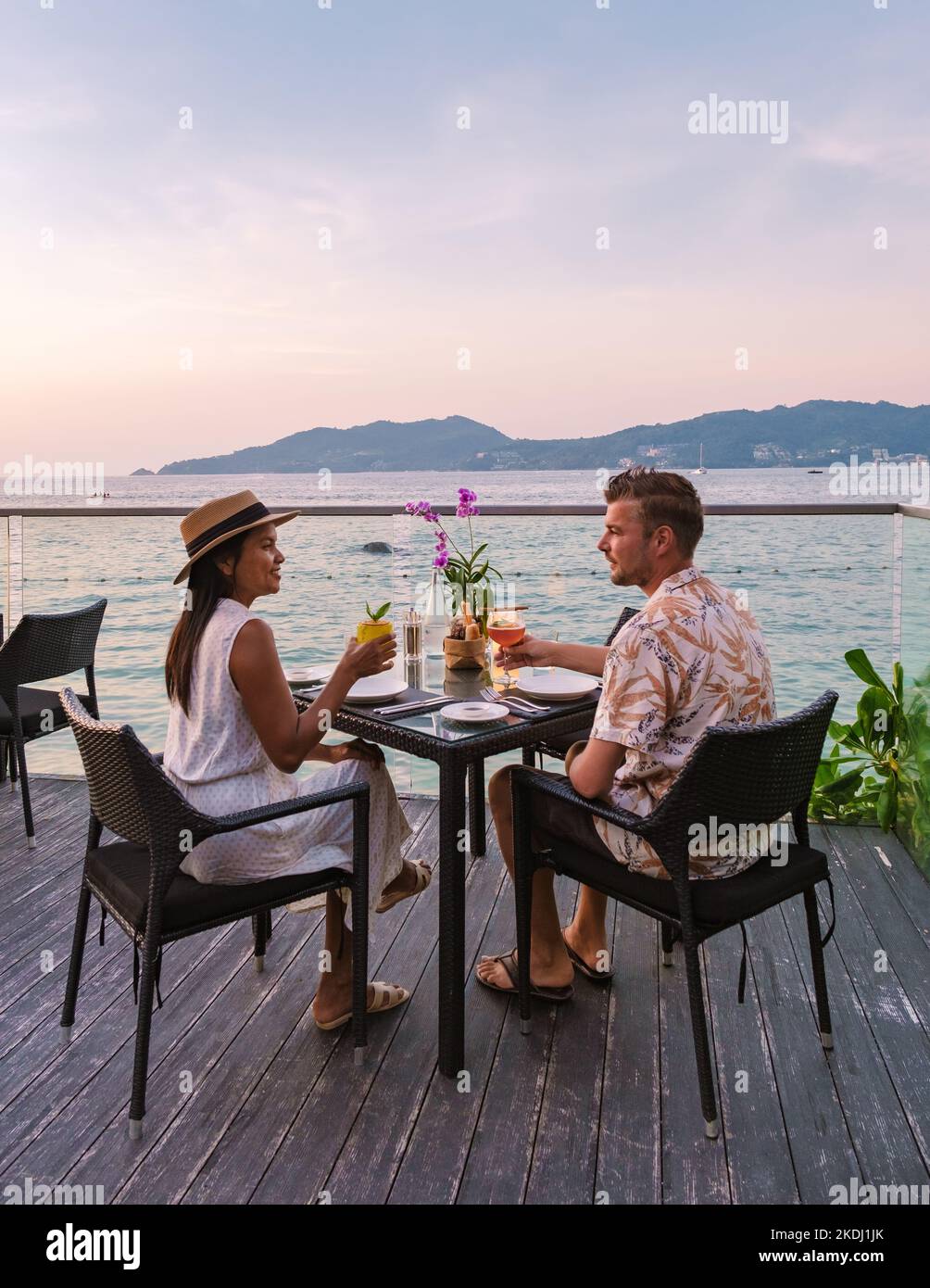 Romantic dinner on the beach with Thai food during sunset on the Island of Phuket Thailand ...