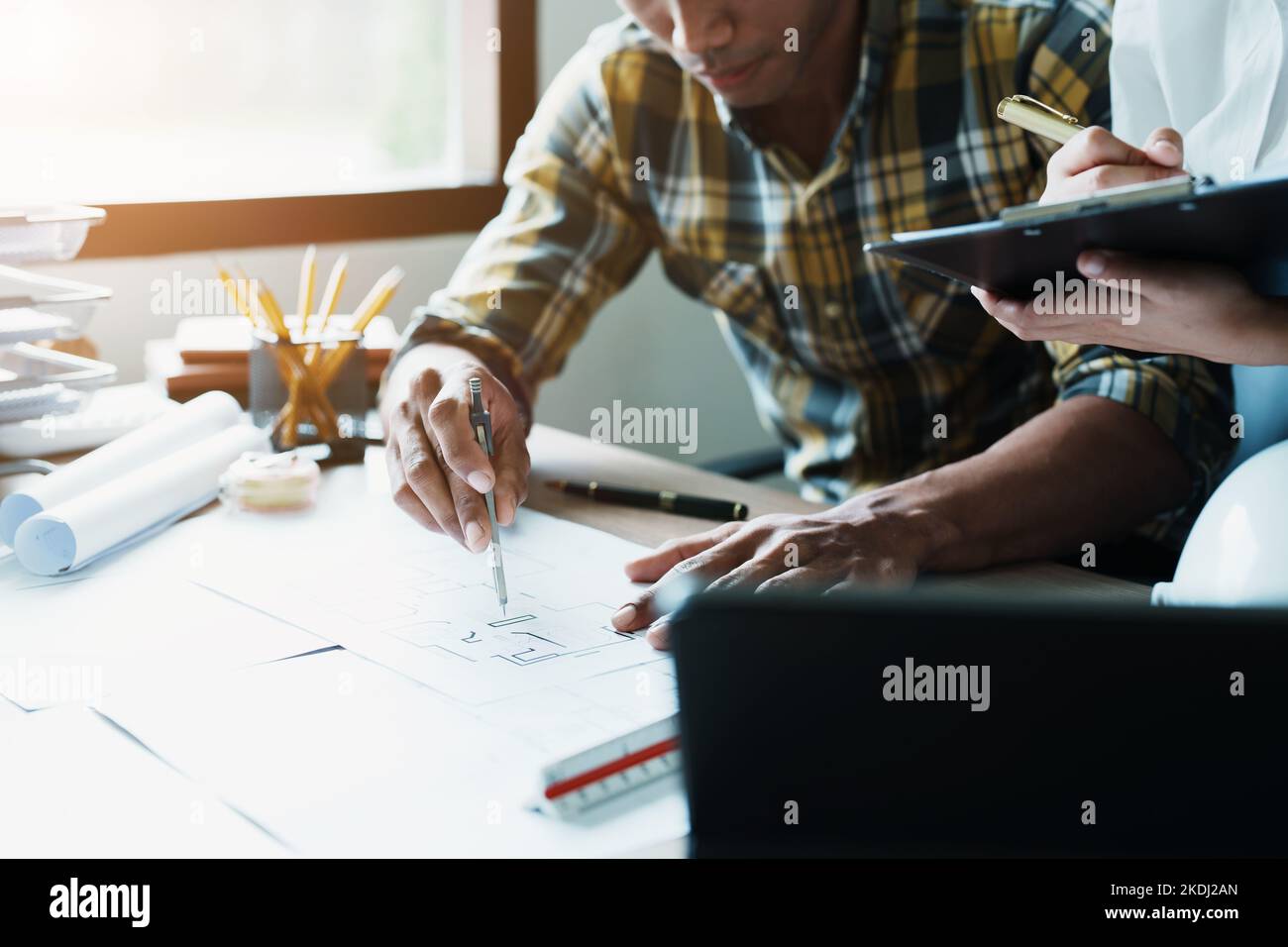 Engineers are consulting the team to design an architectural structure ...