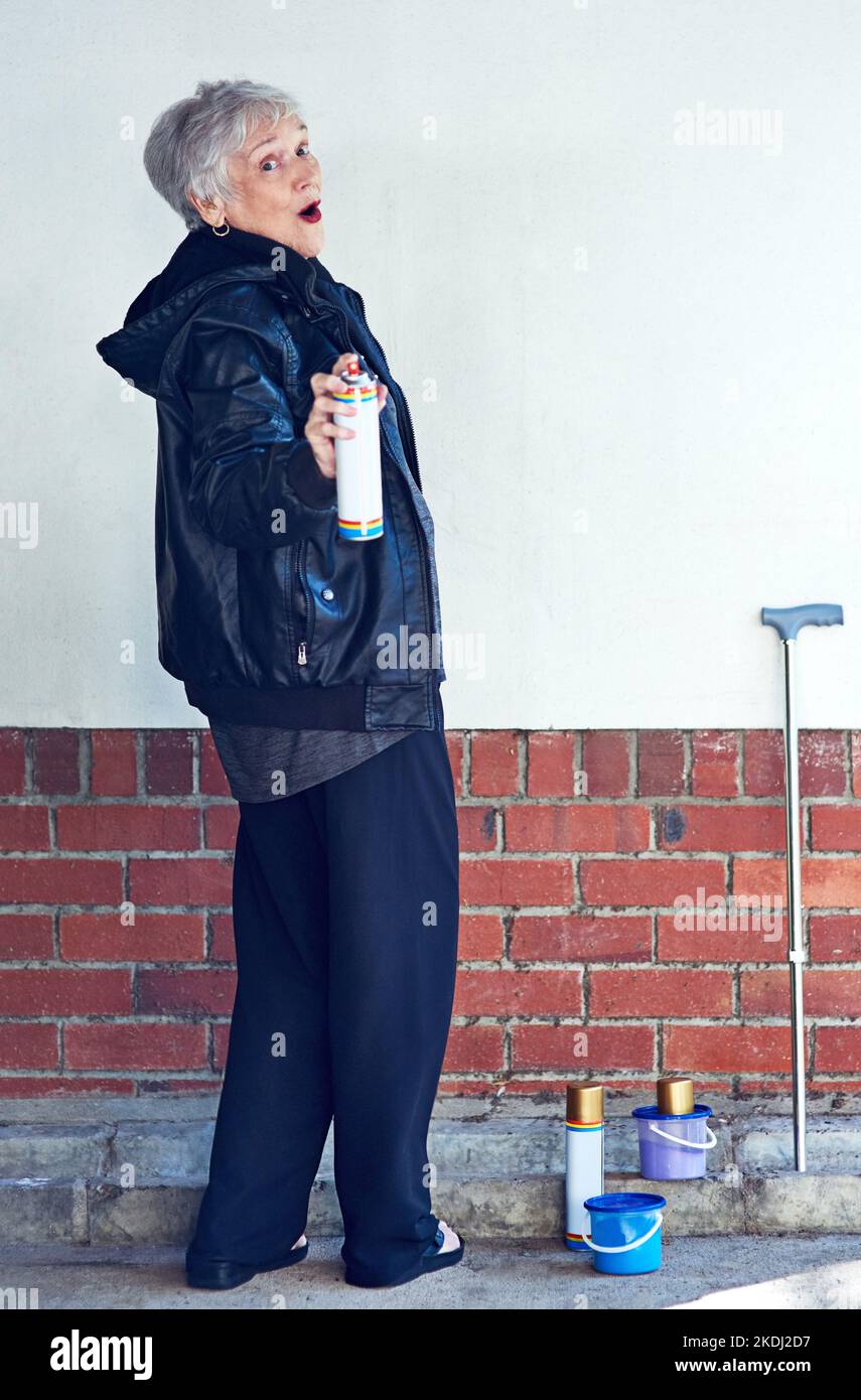 Youre never too old to make your mark. Portrait of a mischievous senior ...