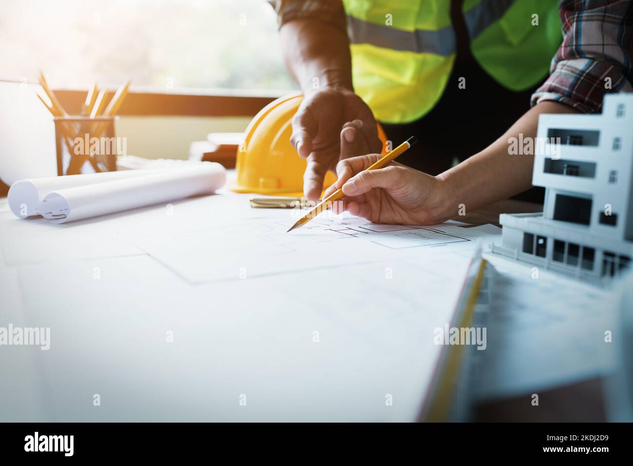 Engineers are consulting the team to design an architectural structure ...