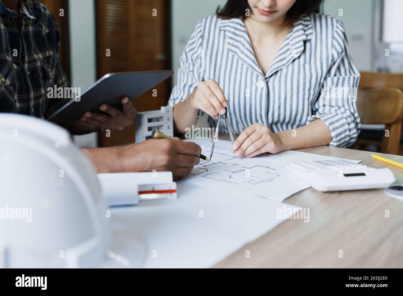 Engineers are consulting the team to design an architectural structure ...