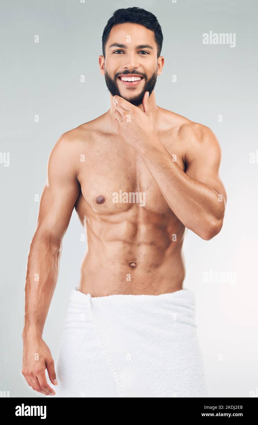 Skincare, beauty and portrait of man with towel in studio on white ...