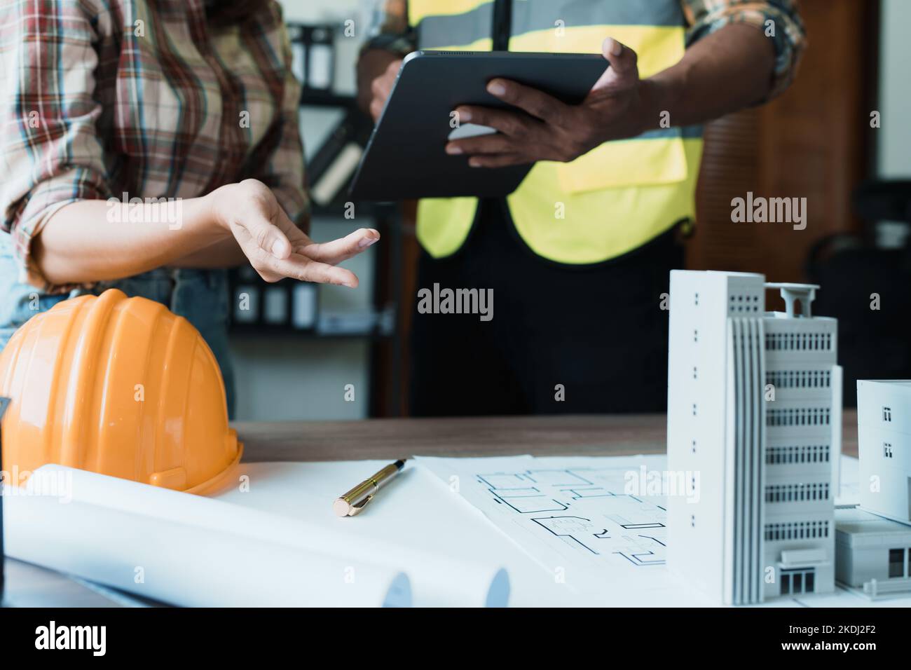 Engineers are consulting the team to design an architectural structure ...