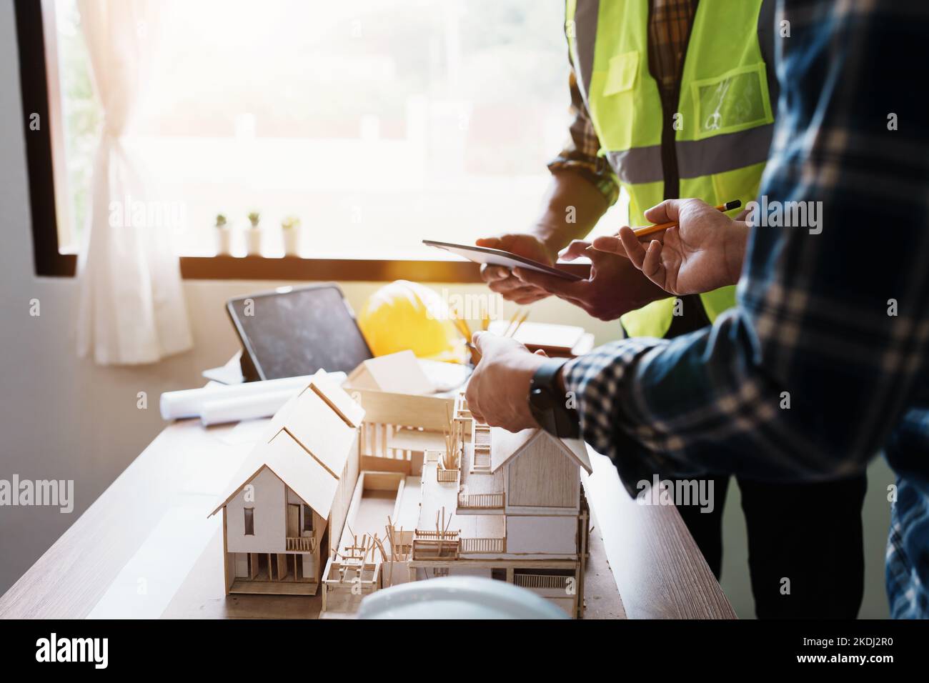 Engineers are consulting the team to design an architectural structure ...