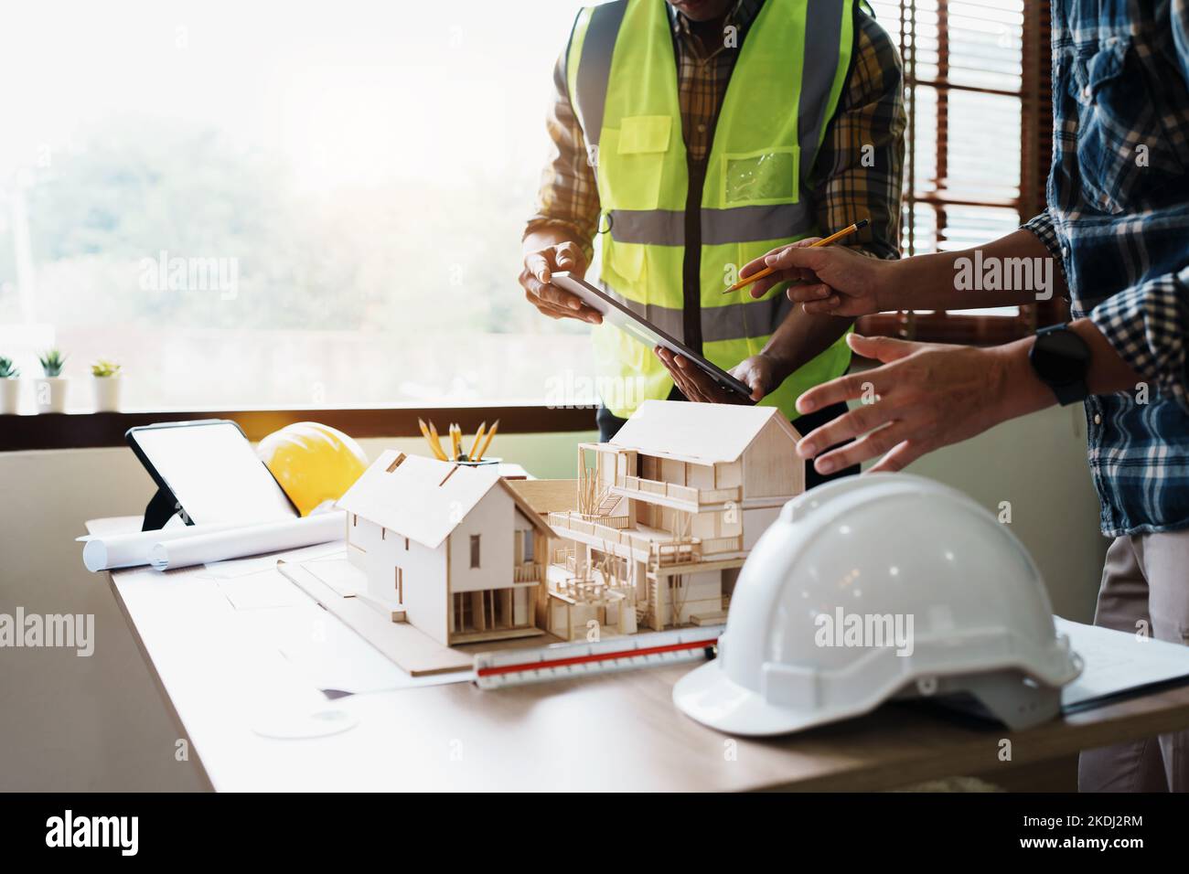 Engineers are consulting the team to design an architectural structure ...