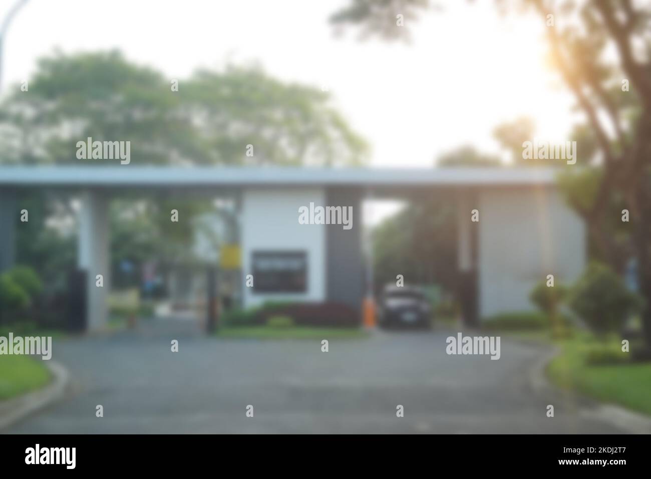 Blurred background. Residential gate with sunshine Stock Photo - Alamy