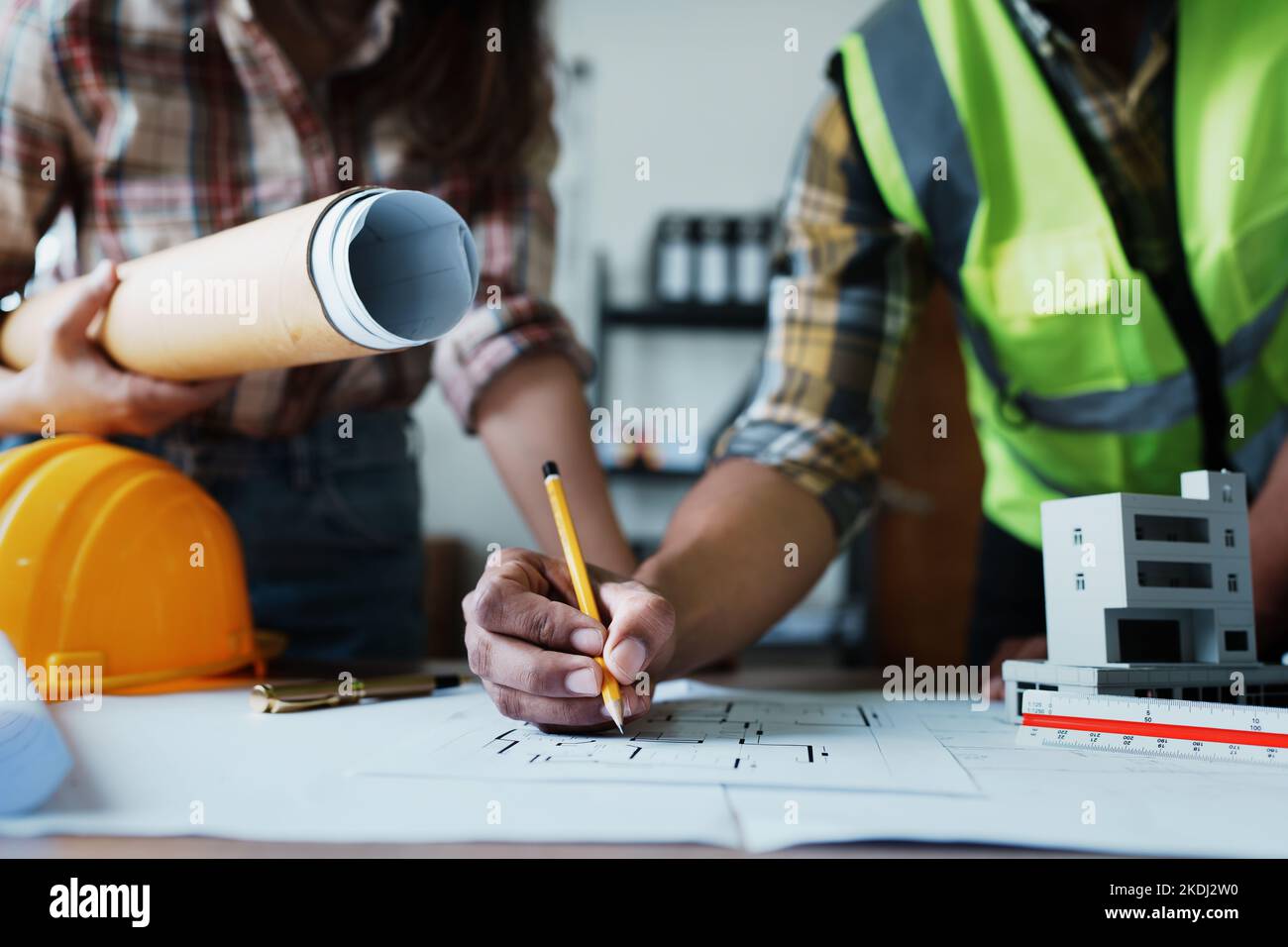 Engineers are consulting the team to design an architectural structure ...