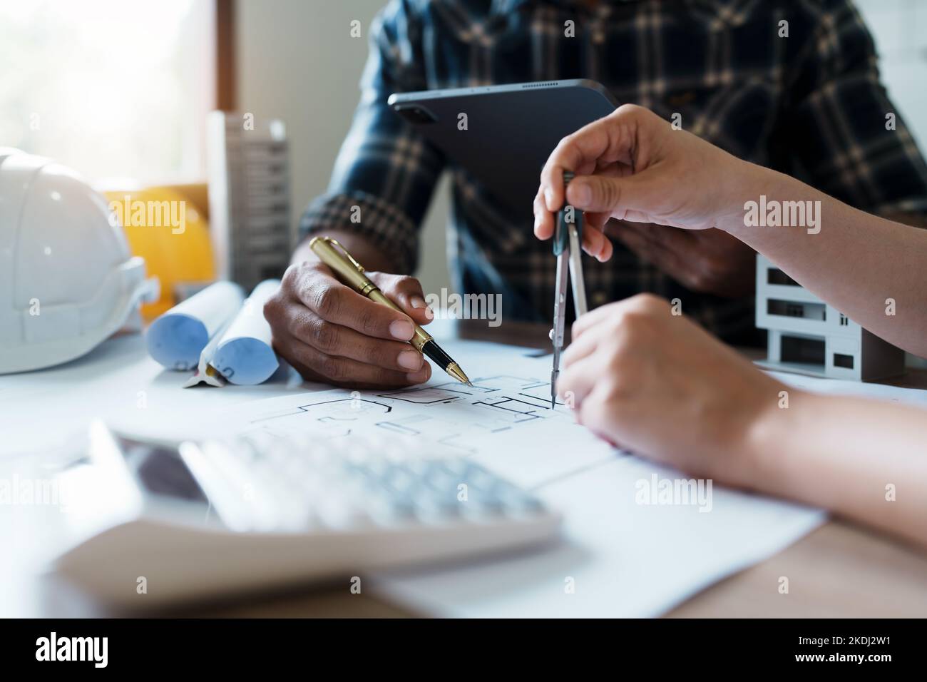 Engineers are consulting the team to design an architectural structure ...