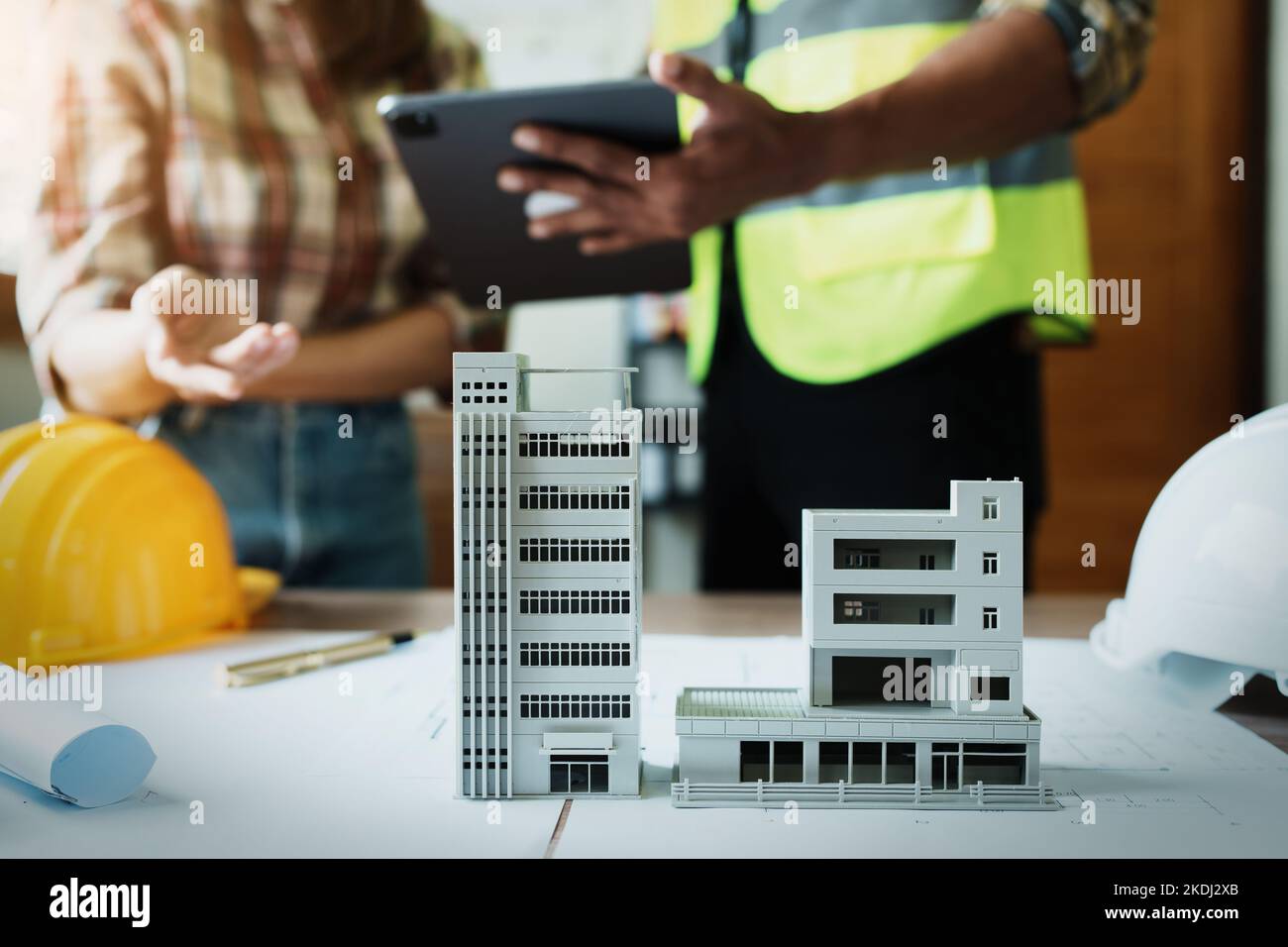 Engineers are consulting the team to design an architectural structure ...