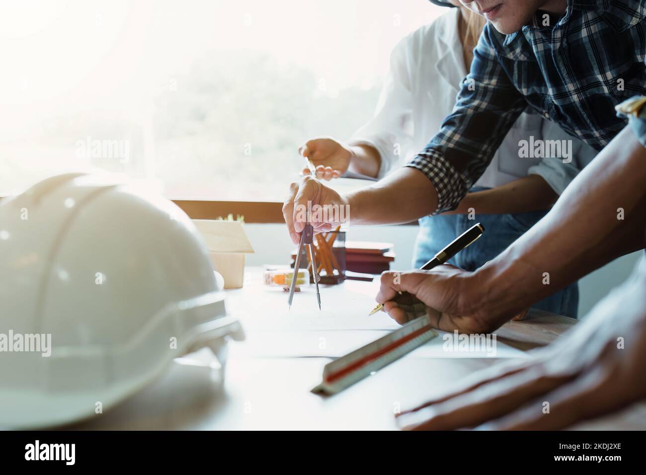 Engineers are consulting the team to design an architectural structure ...